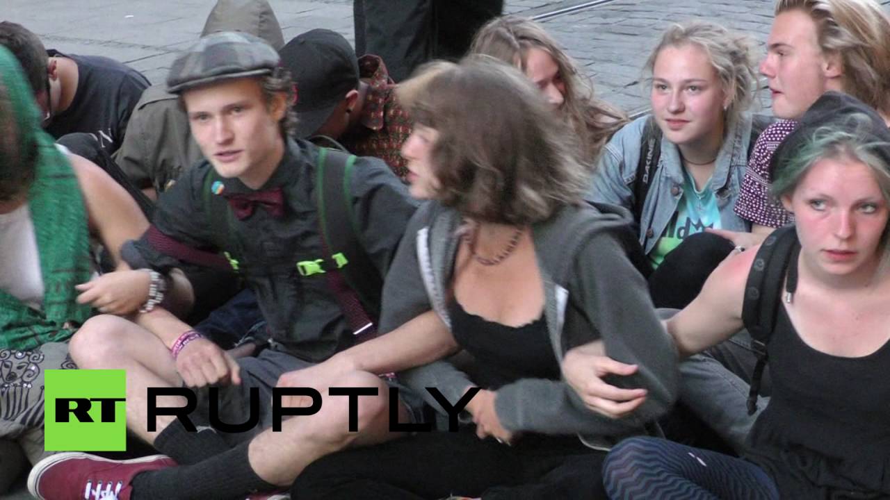 Pokemon Go vs Pegida: Dozens arrested as game fans & Antifa protest far ...