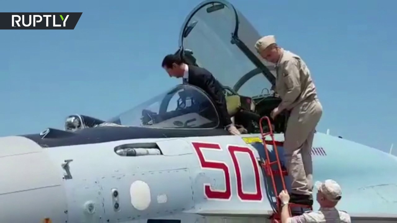 Assad tries out role of Su-35 fighter jet pilot at Russia’s Khmeymim ...