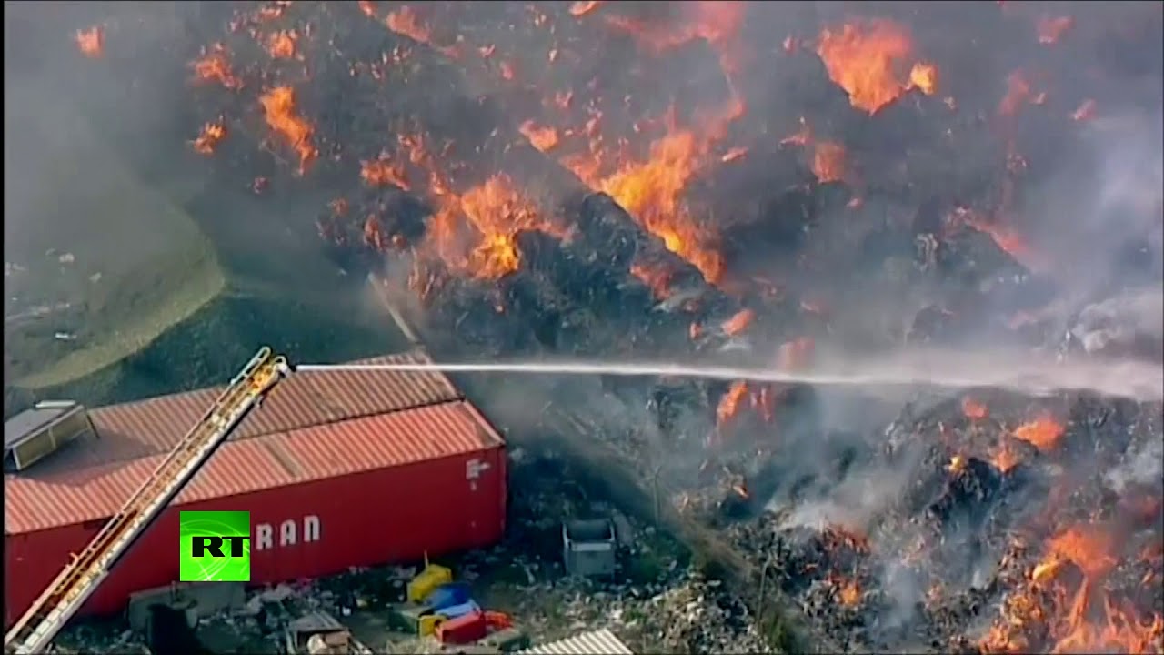 More than 100 homes evacuated due to massive fire at paper recycling ...