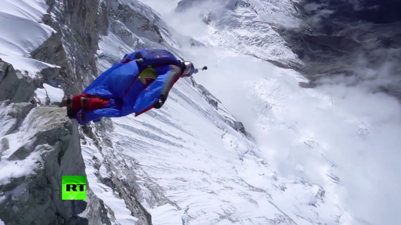 Freefall from 22,000 feet: Russian becomes 1st base-jumper to jump from ...