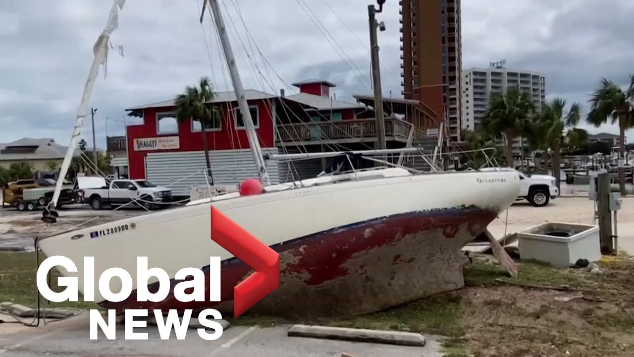 Hurricane Sally: Florida residents clean up after severe damage from ...
