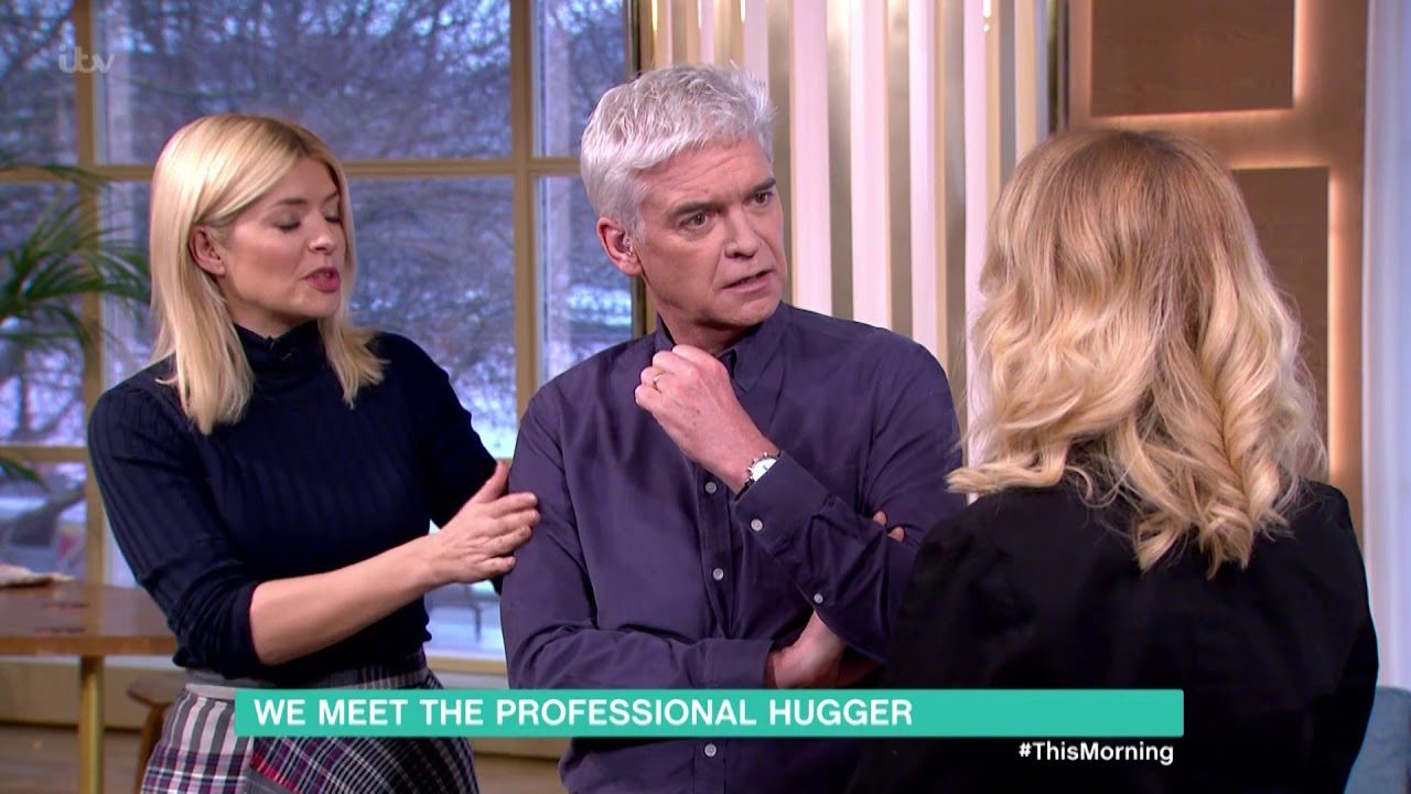 Holly and Phillip Meet the Professional Hugger | This Morning - The ...