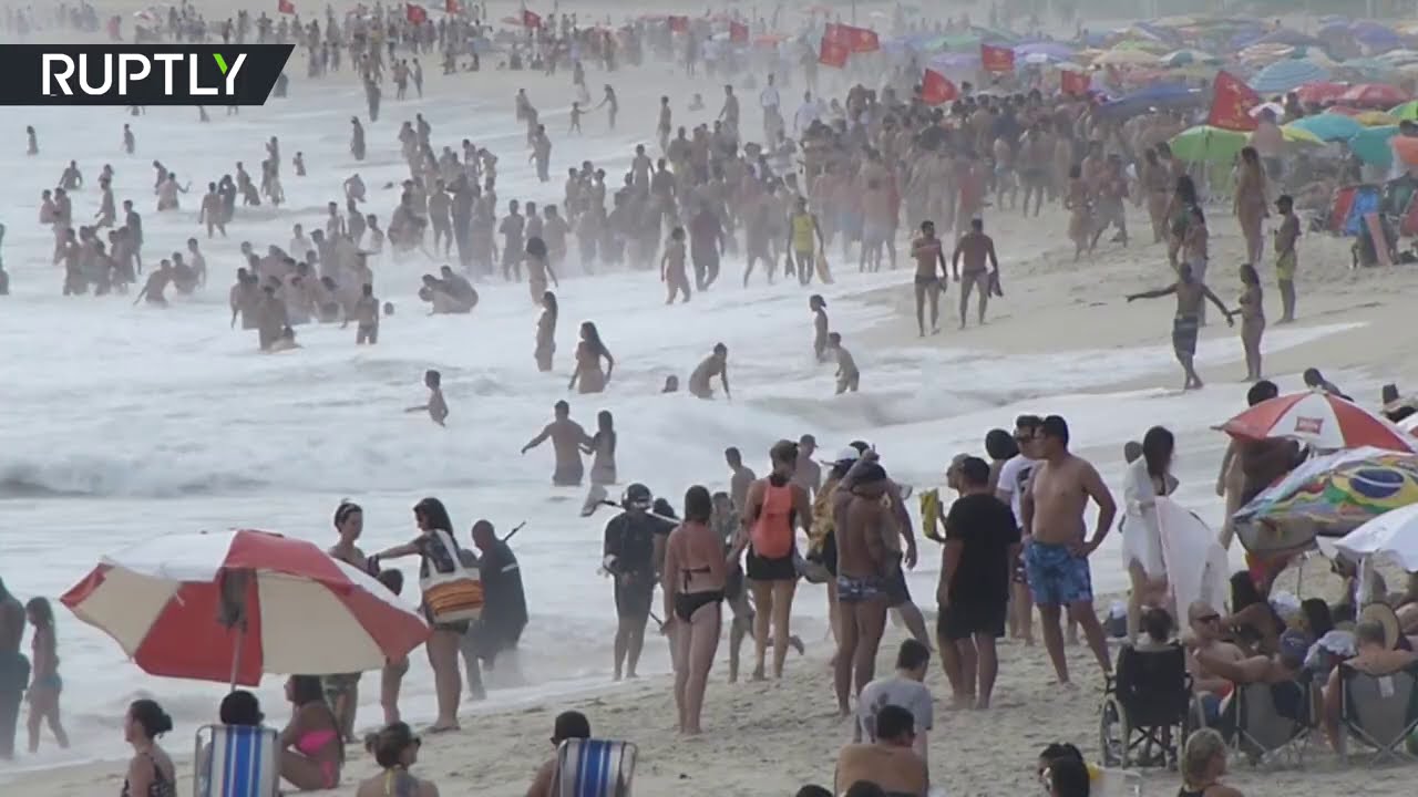 Basking in the sun | Beachgoers pack Rio de Janeiro's coastline despite ...