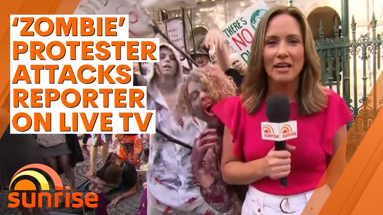 'Zombie' Extinction Rebellion protester attacks reporter on live TV ...