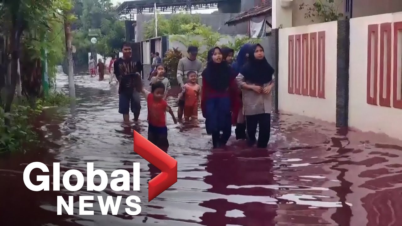 Red rivers run through Indonesian village as flood hits batik ...