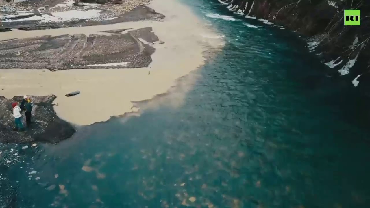 Muddy and clear rivers in confluence in Russia's Adygea - The Global Herald