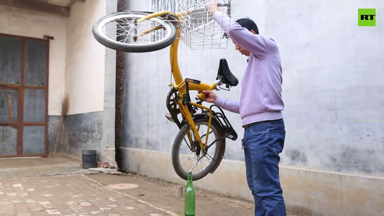 This Chinese gentleman has some amazing balancing talent! - The Global ...