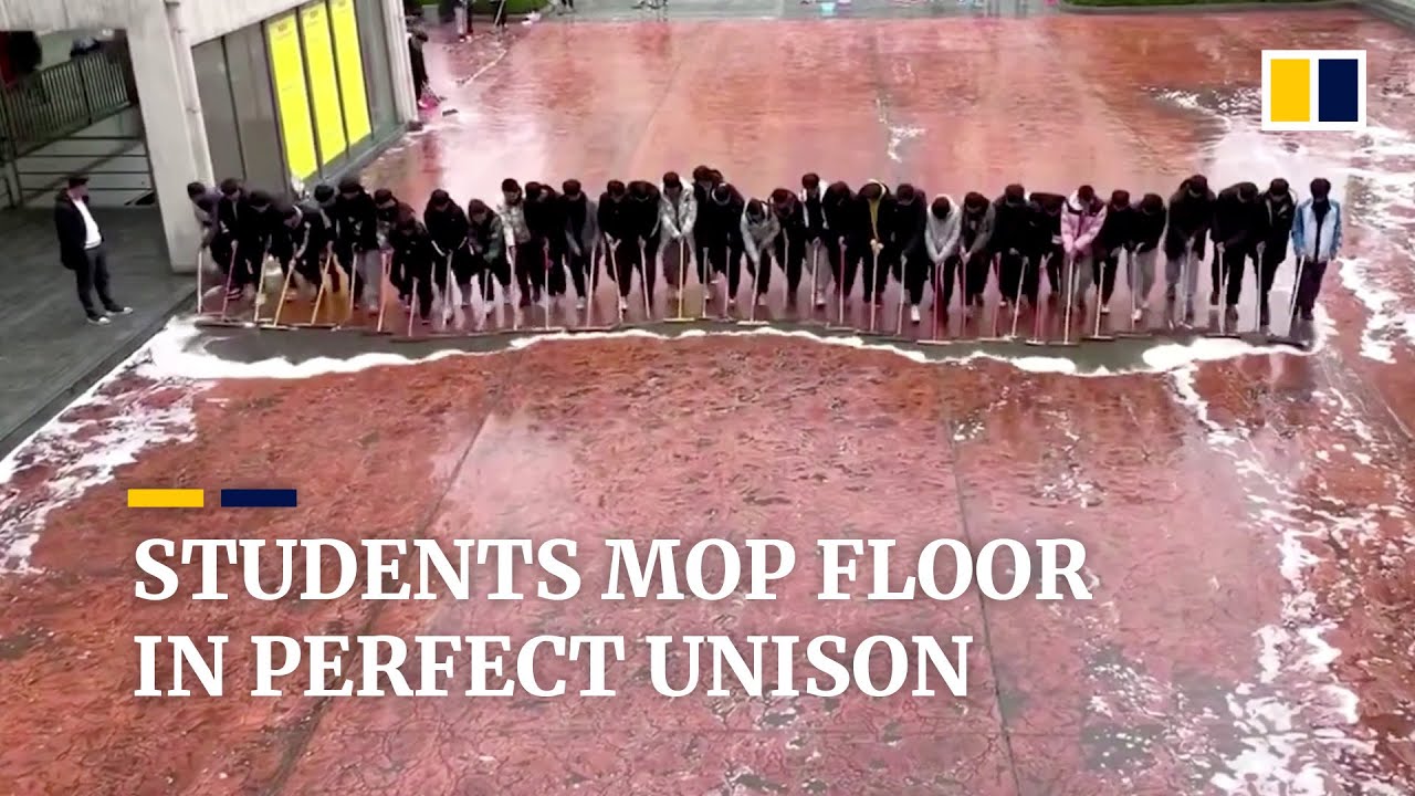 Students stand in line to mop floor in perfect unison in China - The ...