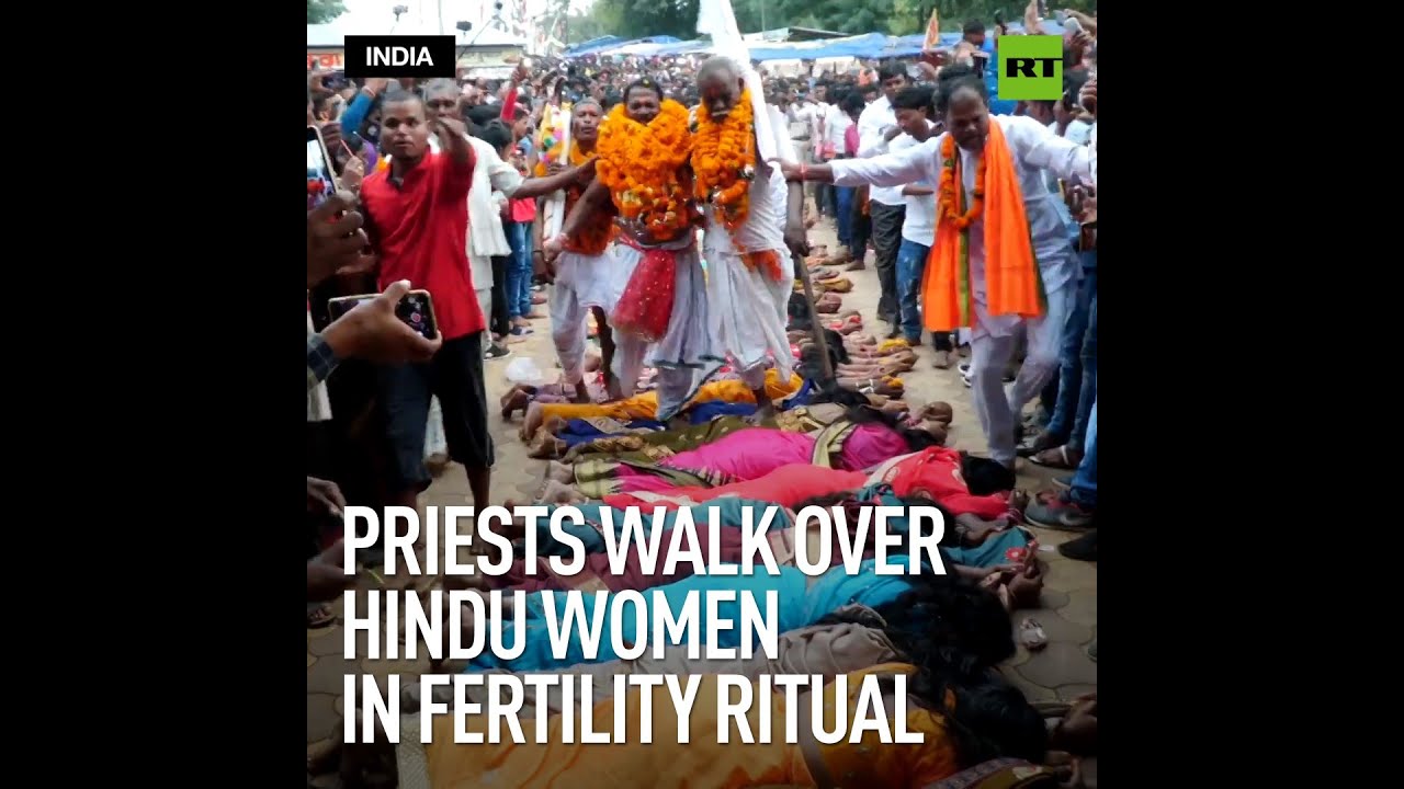Priests TRAMPLE over Hindu women in fertility ritual - The Global Herald