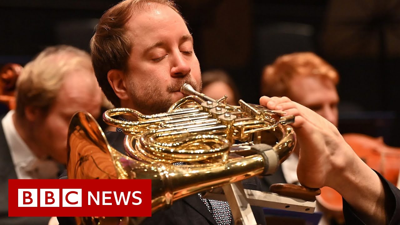 The musician who plays the French horn using his left foot - BBC News ...