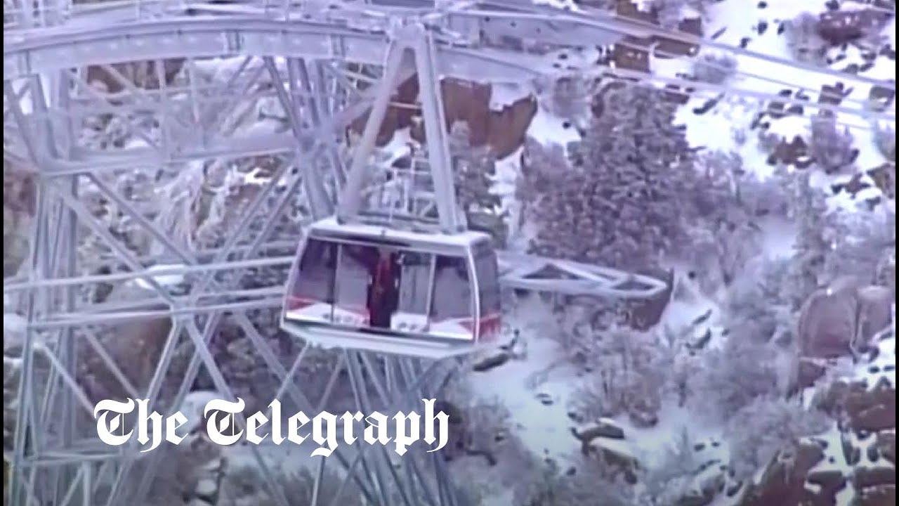 People stranded in cable cars overnight rescued amid icy conditions in ...