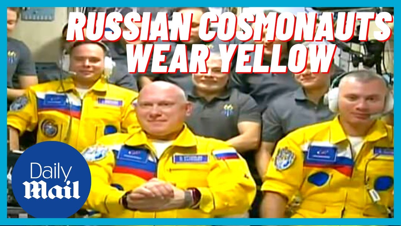 Russian cosmonauts in UKRAINIAN flag colours as they arrive on ISS ...