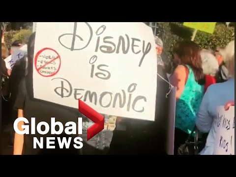 Protesters gather outside Disney headquarters to protest company's ...