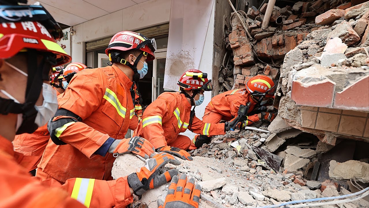 Live: Rescuers search for scores of missing after Changsha building ...