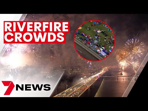 Thousands line up the riverbank for Riverfire 2022 despite the wet ...