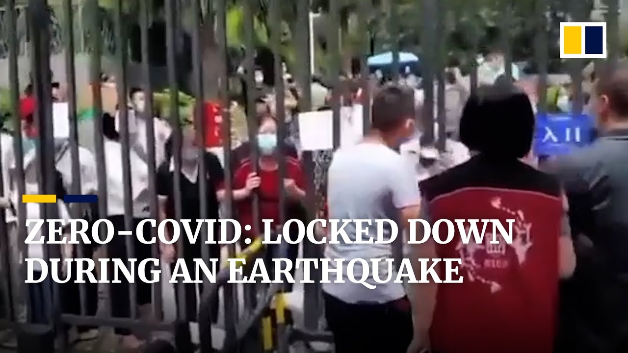 Residents in China argue with guard to leave apartment blocks during ...