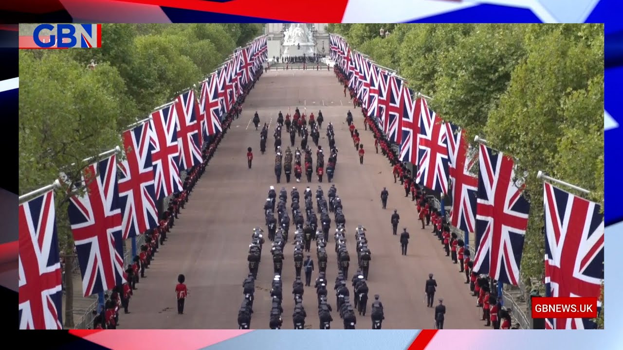 Queen Elizabeth II's coffin is drawn in a procession from Westminster ...