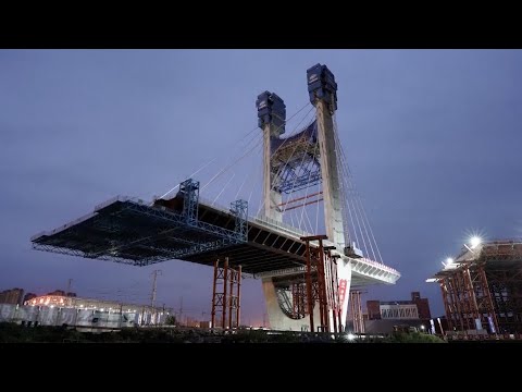 Massive bridge tower in central China completes record-setting rotation ...