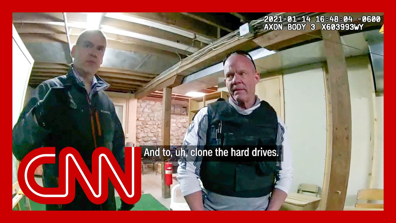 Watch these men pose as officials and try to copy 2020 election data ...
