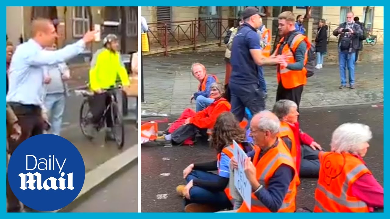 'Oi, don't touch him!' Furious bust-up at Just Stop Oil South London ...