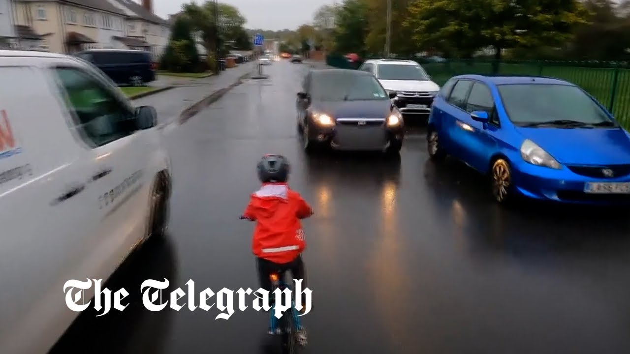 Controversial bike cam shows driver 'squeezing' past five-year-old ...