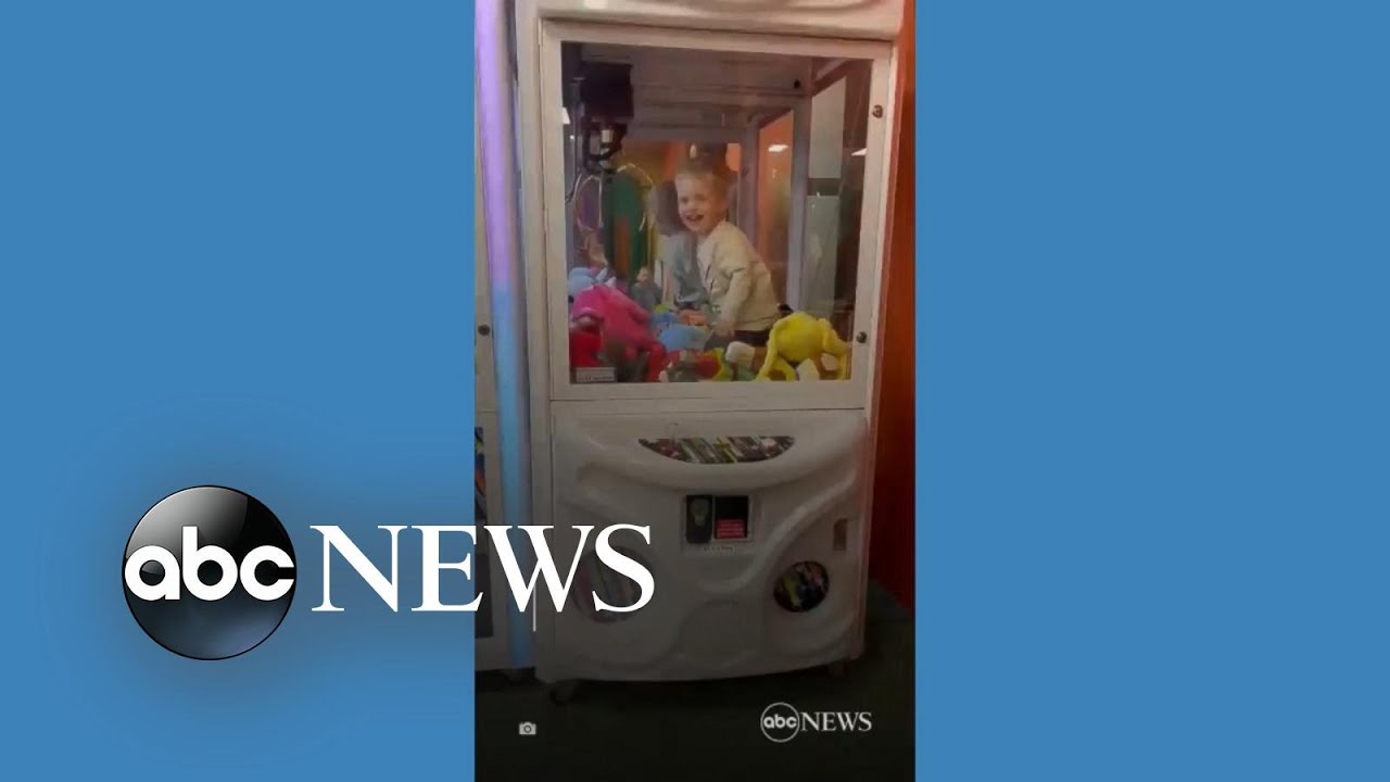 Toddler 'very happy' as he finds his way inside claw machine - The ...