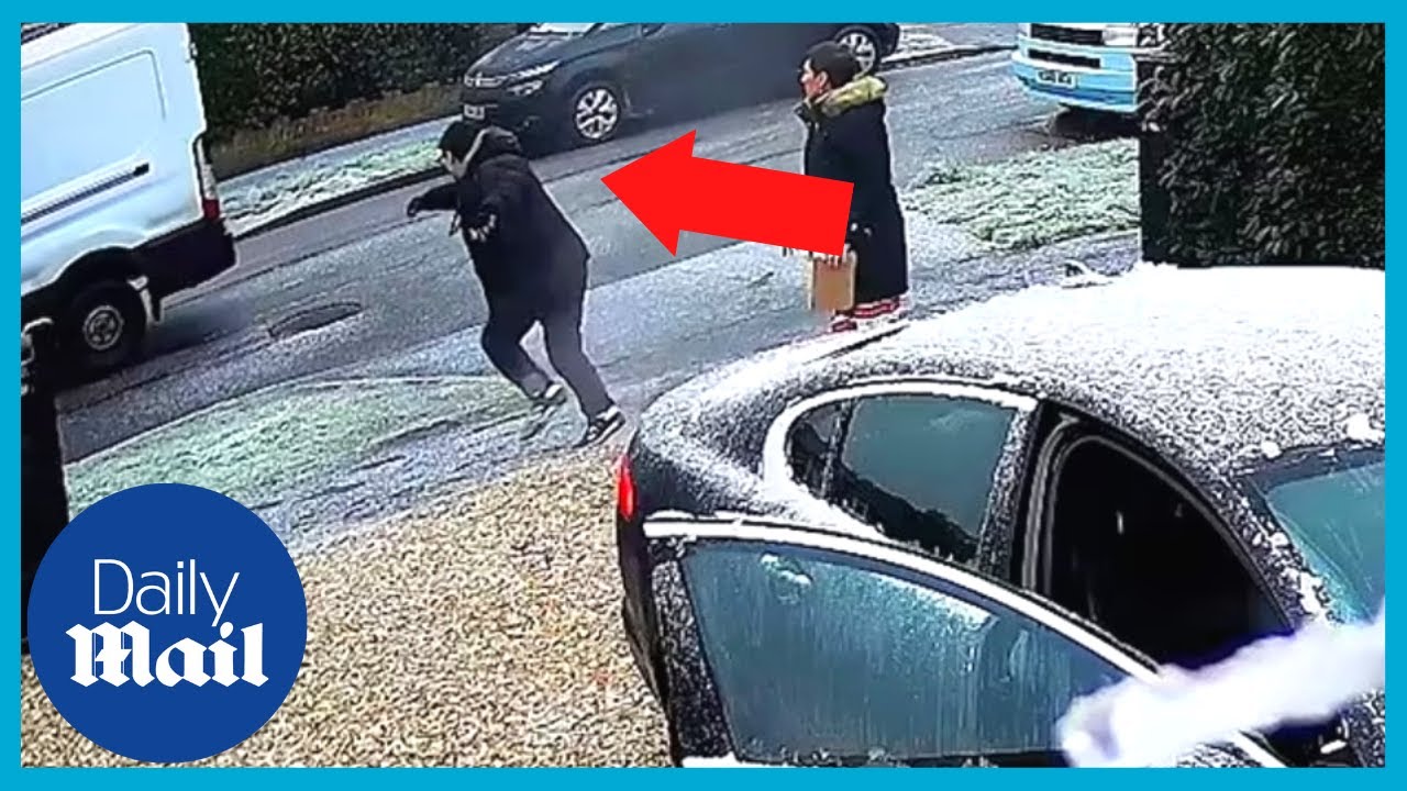 UK Weather: Funny moment delivery driver slips on ice while chasing his ...