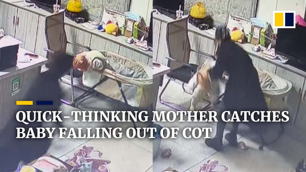 Quick-thinking mother in China catches baby falling out of cot - The ...