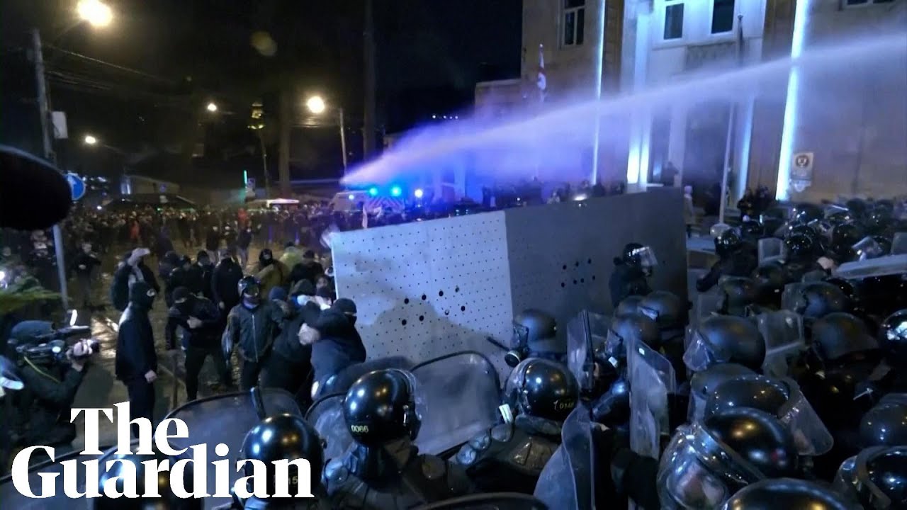 Police fire water cannon and stun grenades as thousands of Georgians ...