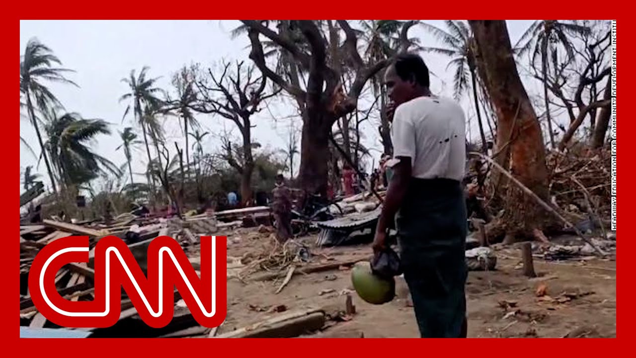 Man wipes away tears describing family swept away by cyclone - The ...