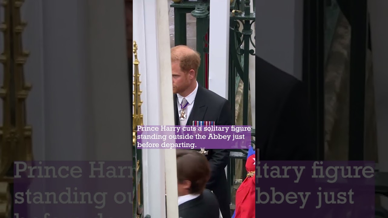Prince Harry standing outside the Abbey before departing the Coronation ...