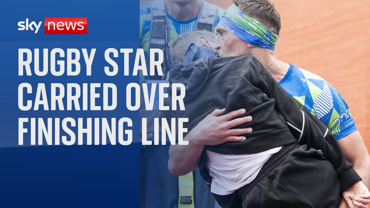 Emotional scenes as ex-rugby star Rob Burrow is carried over finish ...