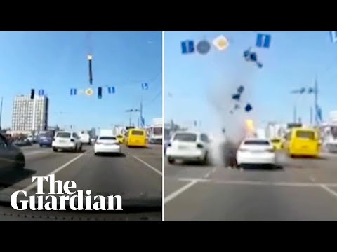 Dashcam video shows falling missile debris hitting busy Kyiv road ...