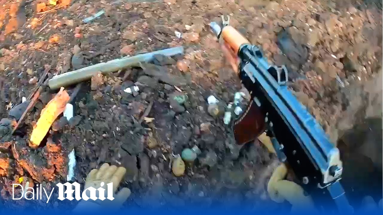 Ukrainian soldiers storm Russian trench in fight for Bakhmut's 'Road of ...