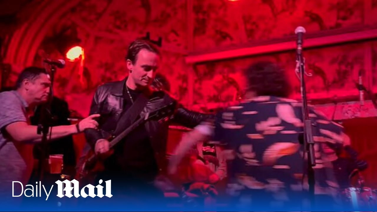 Shocking moment band's comeback gig descends into an on-stage fight ...