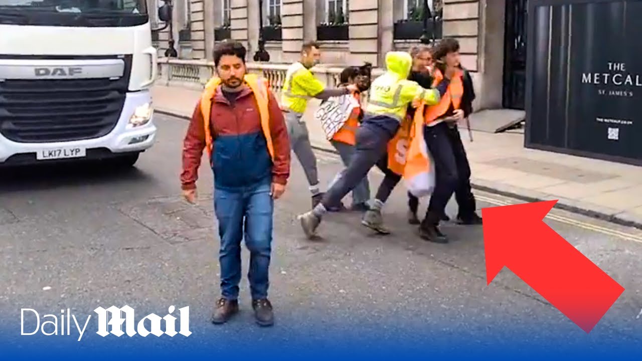 Angry scaffolders push Just Stop Oil protesters out of the road in ...