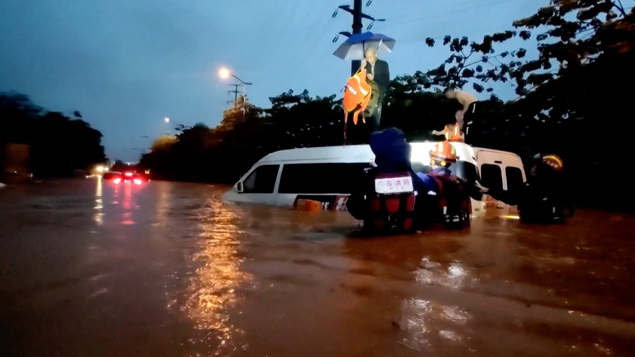 Rescuers save residents trapped in heavy rain in south China - The ...