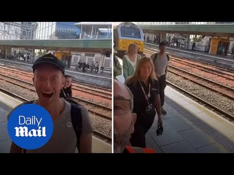 Coldplay frontman Chris Martin arrives by train stunning commuters in ...