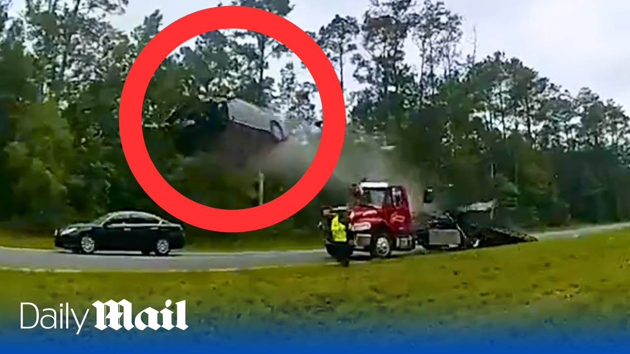 Car flies 120ft through the air after hitting tow truck ramp at high ...