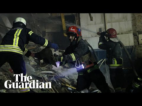 Rescuers dig through rubble after strike hits residential district in ...