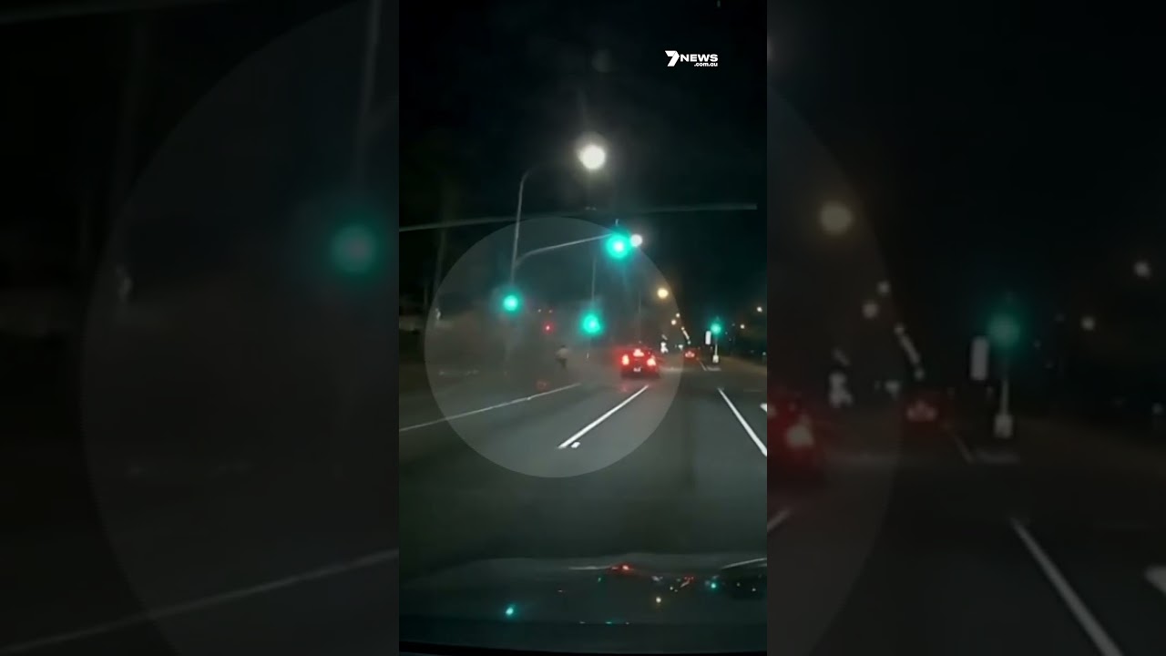 Driver narrowly misses pedestrian after losing control of car | 7NEWS ...
