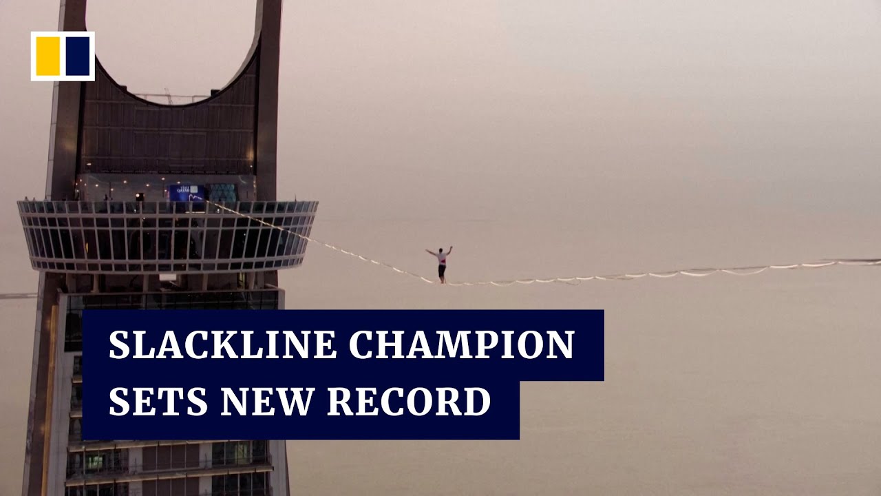 Slackline champion completes world’s longest single-building walk ...
