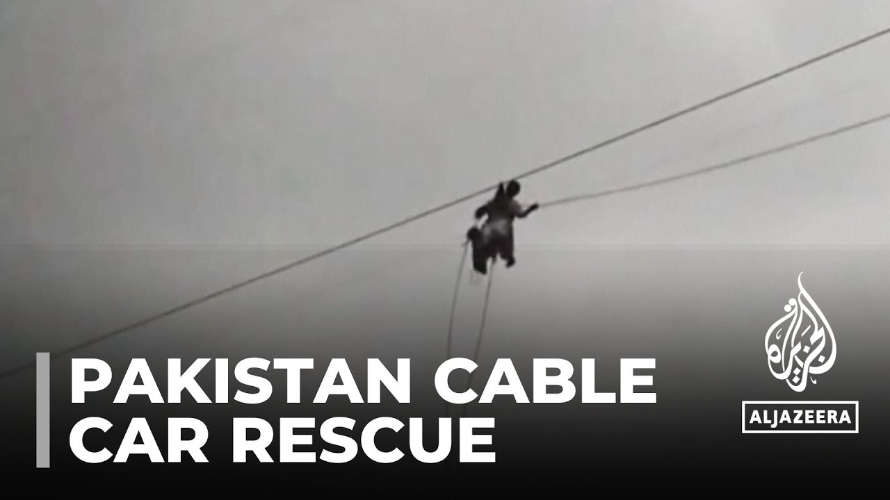 Rescuers save 8 people trapped in cable car dangling above canyon in Pakistan - The Global Herald