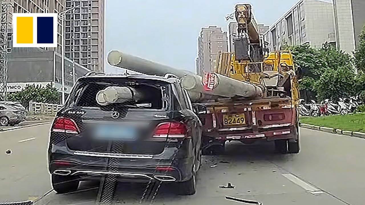 Driver narrowly escapes injury after SUV impaled by poles in China ...