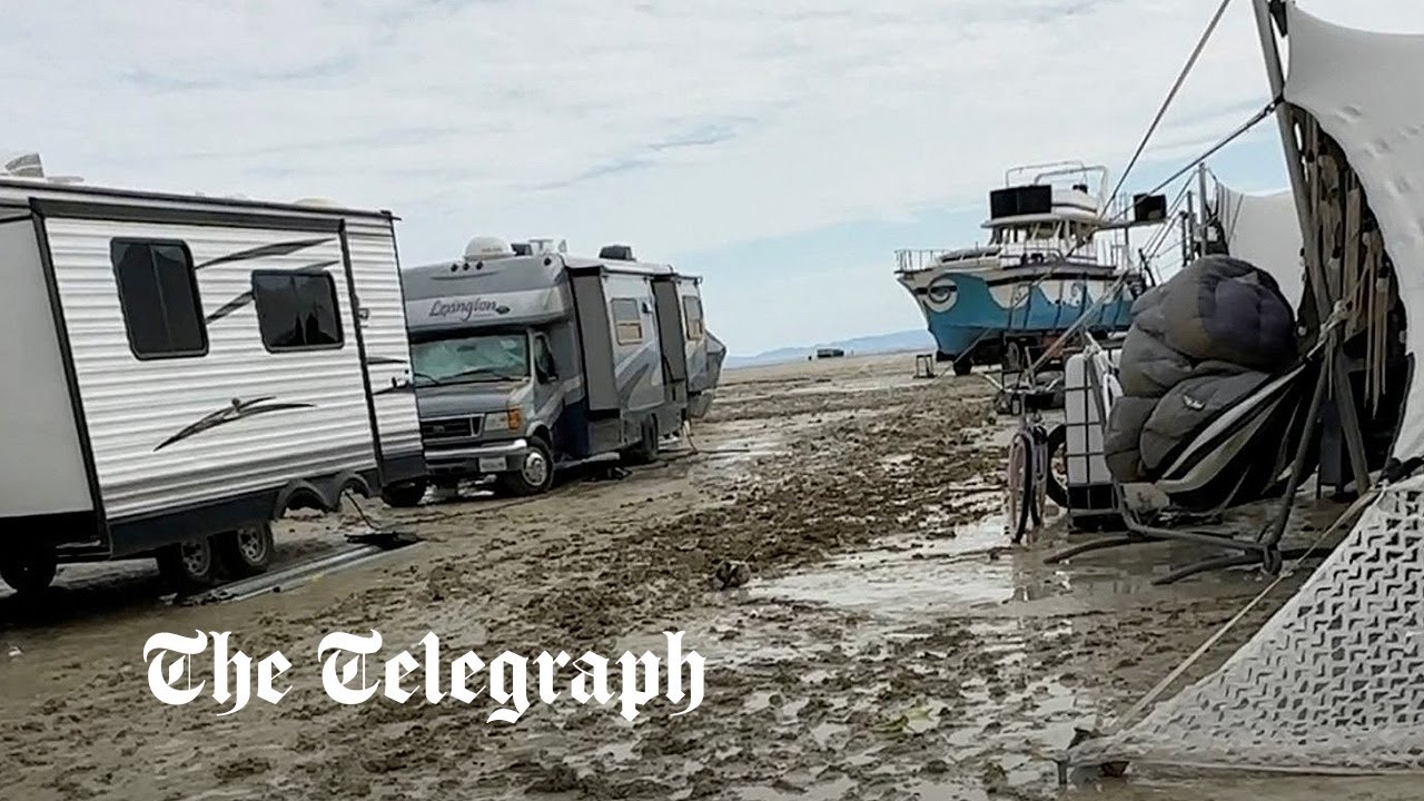Thousands of revellers trapped by Burning Man mud bath after flash ... Thousands of revellers trapped by Burning Man mud bath after flash ...