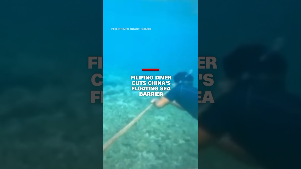 Filipino diver cuts China’s floating barrier - The Global Herald