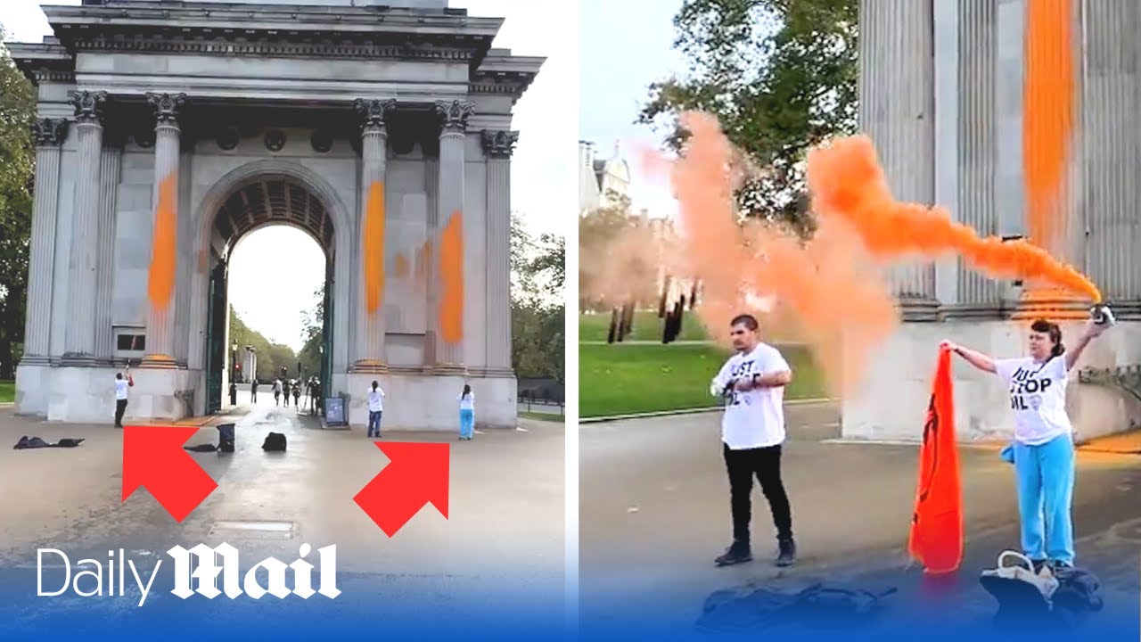 Moment Just Stop Oil eco-mob spray London's Wellington Arch with orange ...