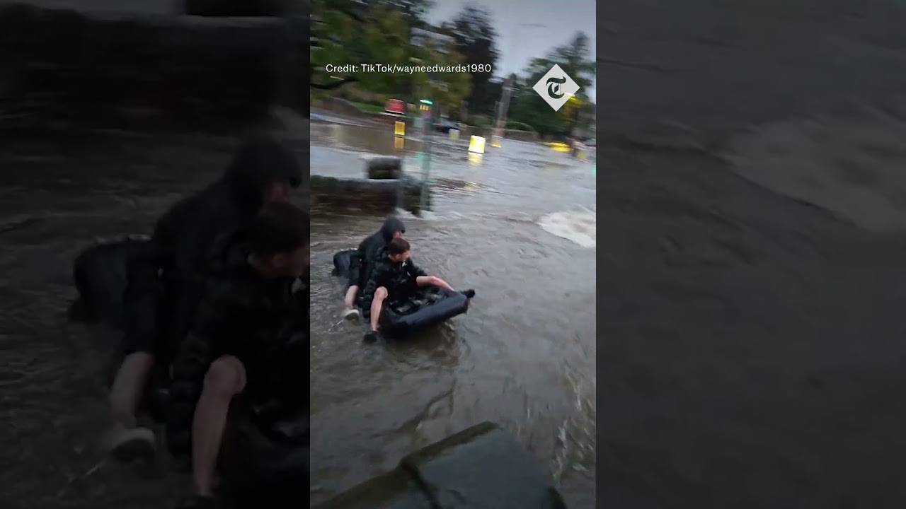 Boys use air mattress as river raft in Storm Babet floodwaters - The ...