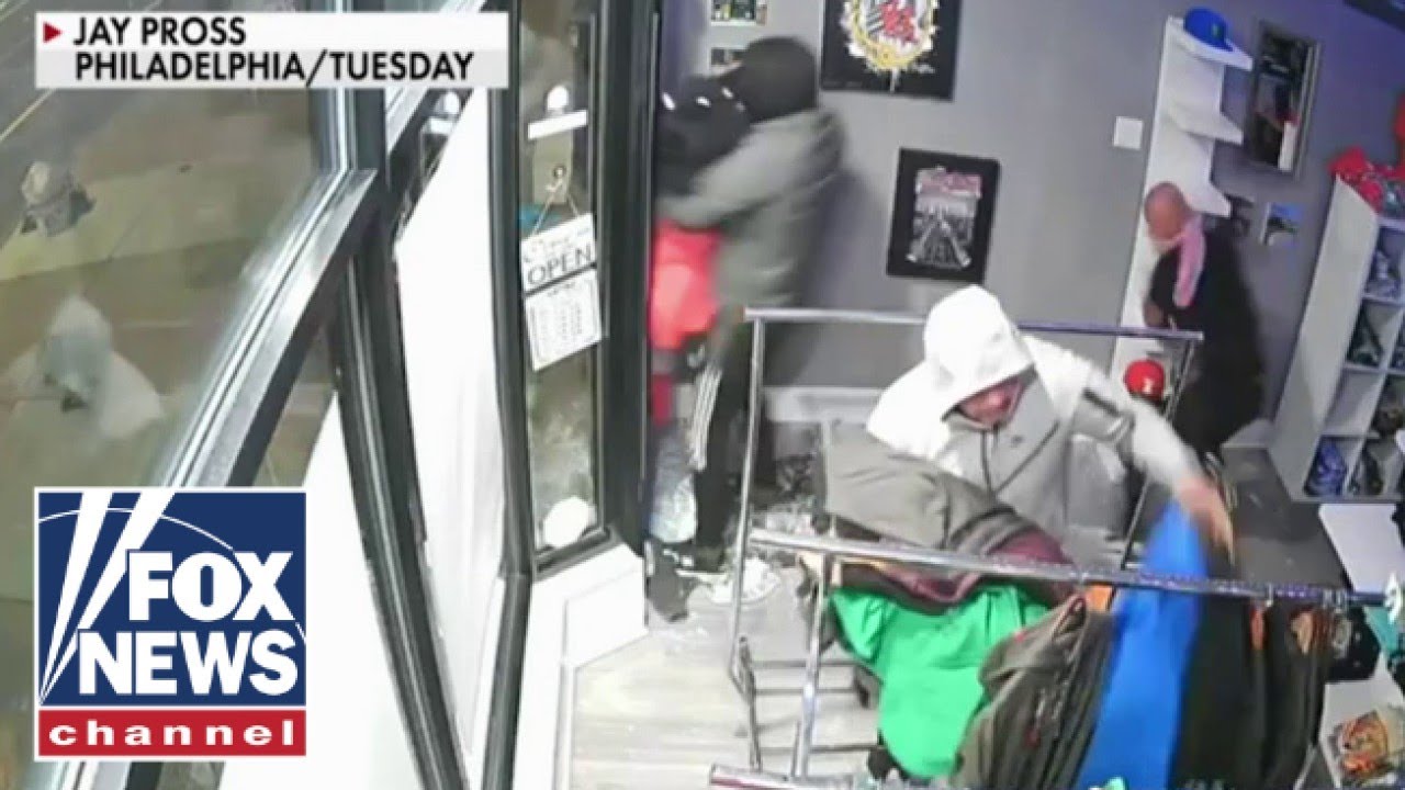 Looters hurl rock at storefront before ransacking merchandise - The ...