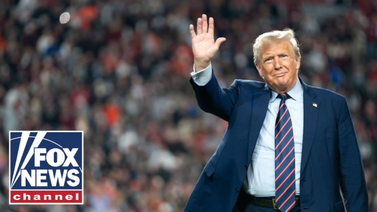 Trump gets loud cheers at University of South Carolina football game ...
